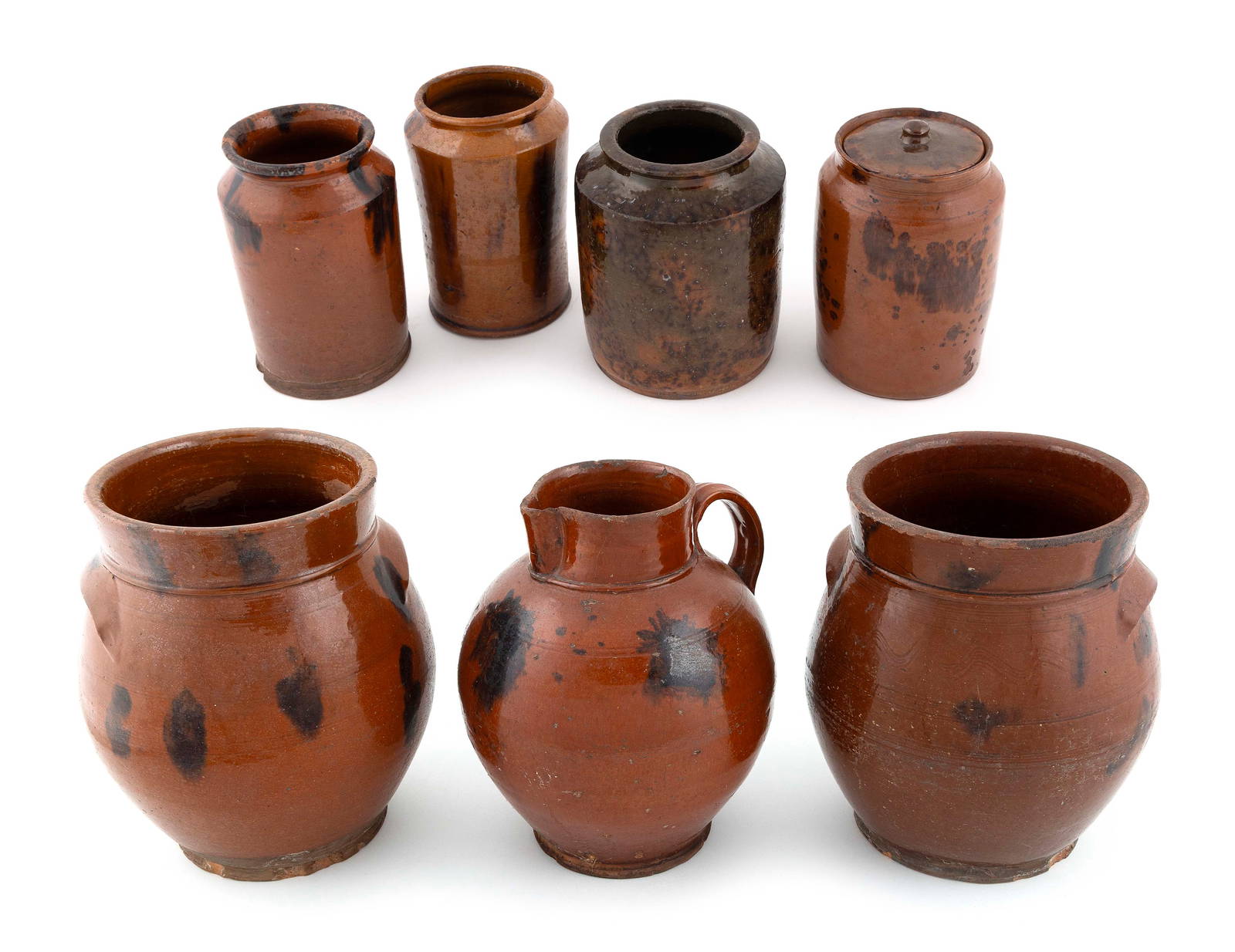 Seven Pieces Of Lead-glazed Redware New England, Early 19th Century Heights To 10.75". Auction