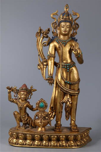 A Gilt Bronze Acalanatha Buddha Statue