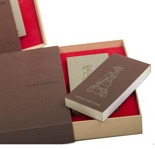 Louis Vuitton Eiffel Tower flip books Pair of Louis Vuitton Tour Eiffel ...