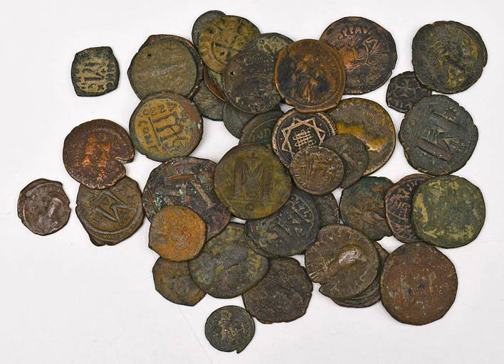 A Group Of Ancient Roman Bronze Coins