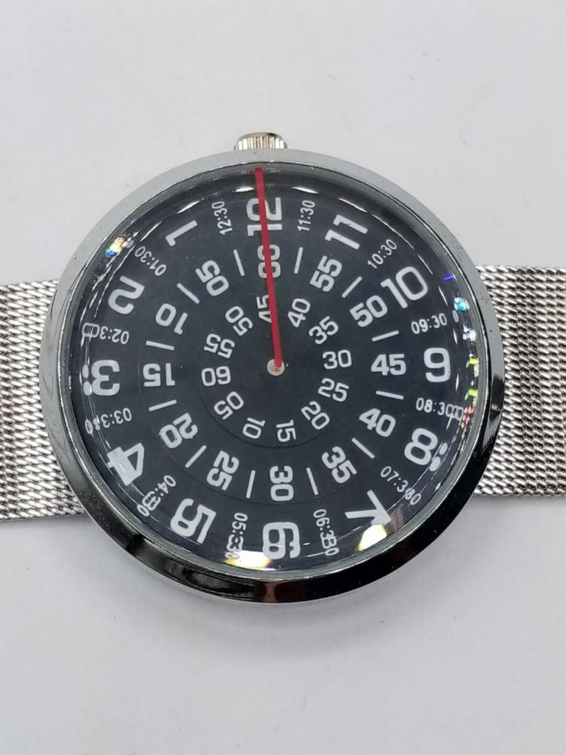 An Unusual Paidu Rotating Dial Watch On Steel Mesh
