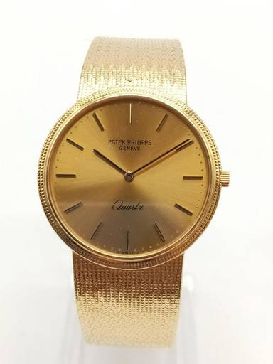 18k Gold Patek Philippe Geneve Quartz Watch With Solid