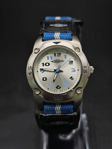 An Umbro Watch. Stainless Steel Case 33 Mm, Silver Tone Dial With Black ...