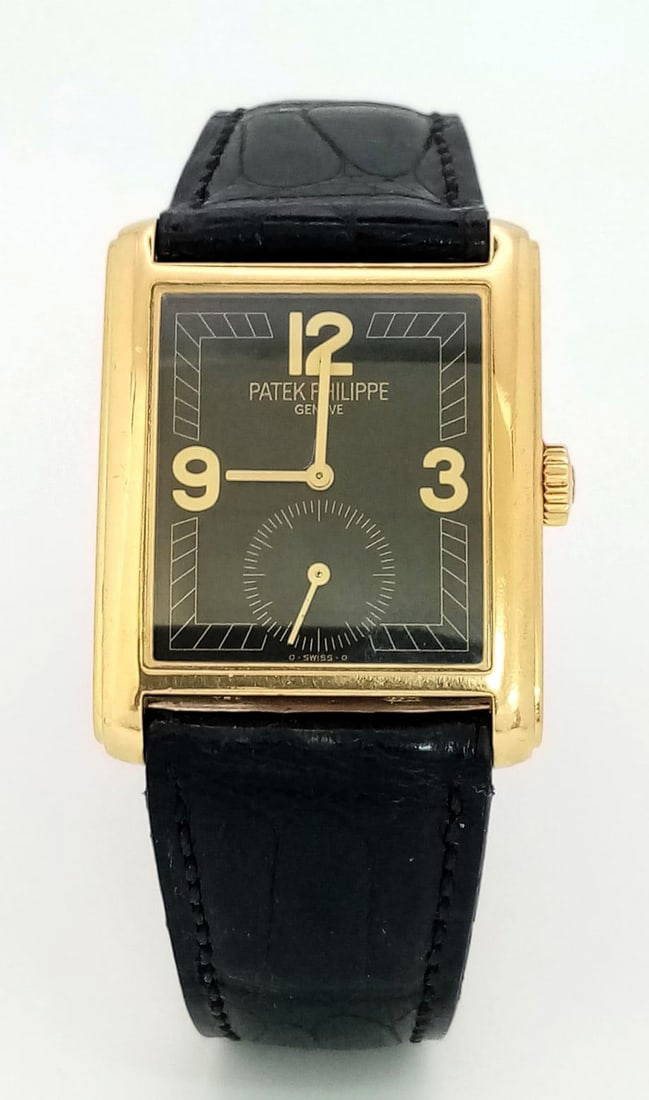 A Patek Philippe Vintage 18k Gold Tank Style Watch With A Subdial And ...