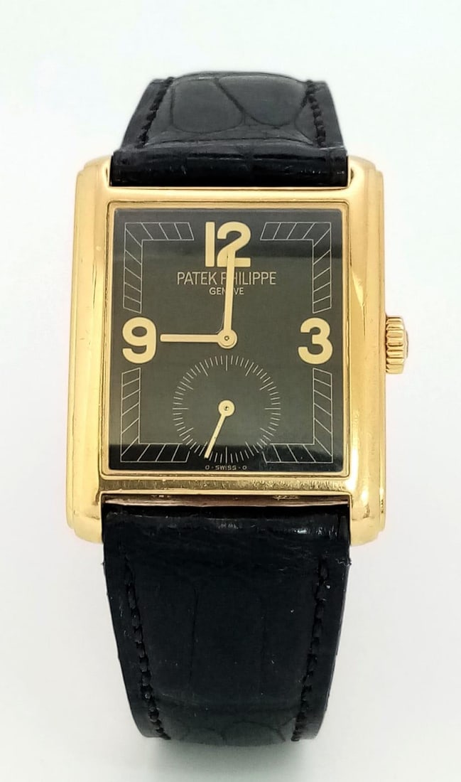 A Patek Philippe Vintage 18k Gold Tank Style Watch With A Subdial And ...