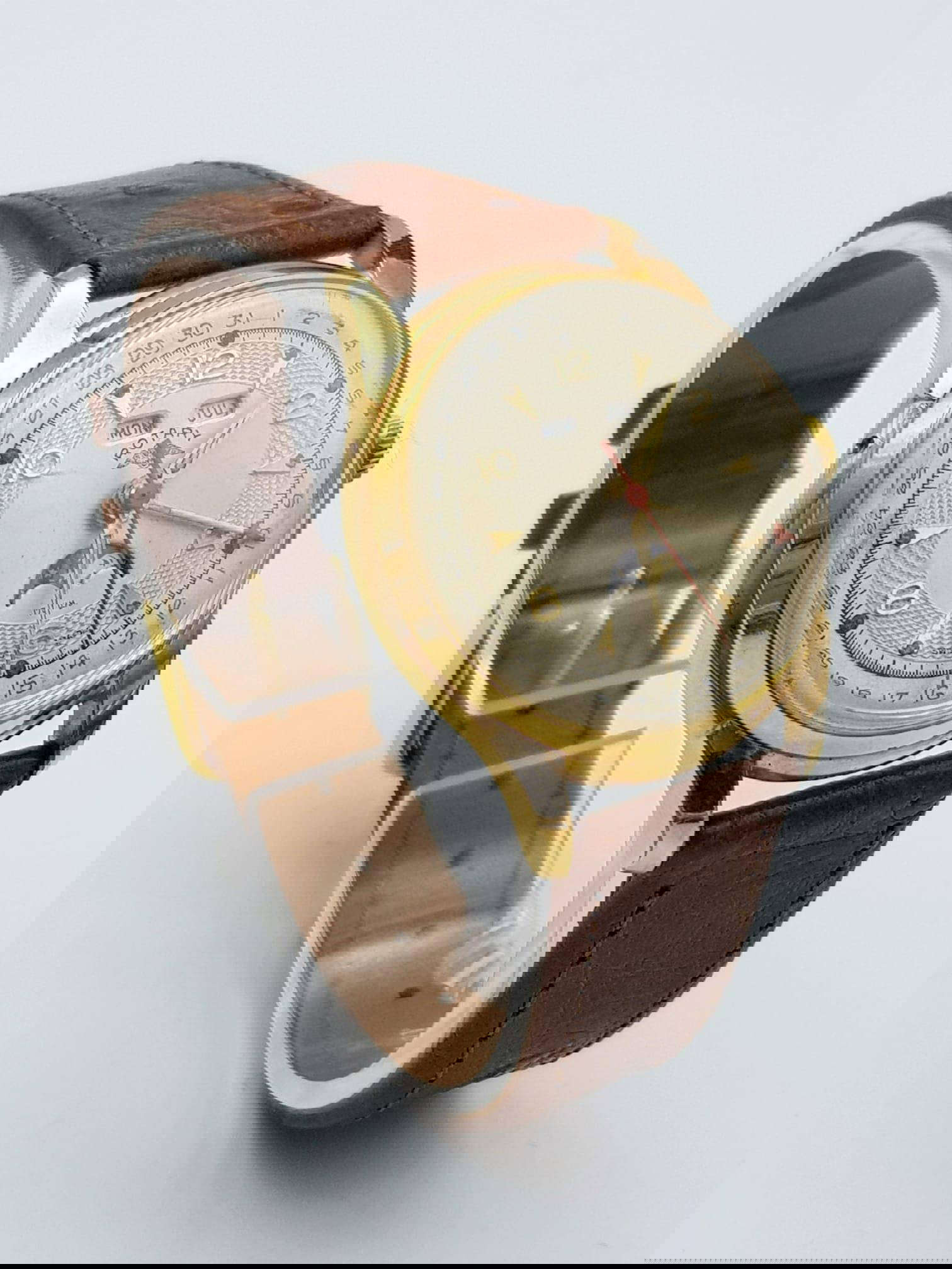 A Vintage Rotary Moonphase Mid Size Watch With Date Box And On A Brown ...