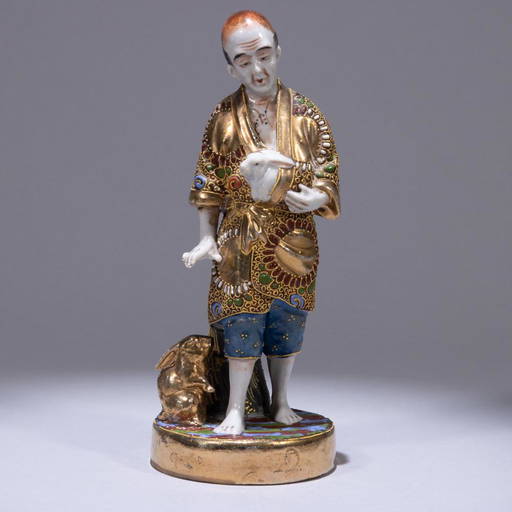 Japanese Satsuma Sculpture Of Man With Rabbits