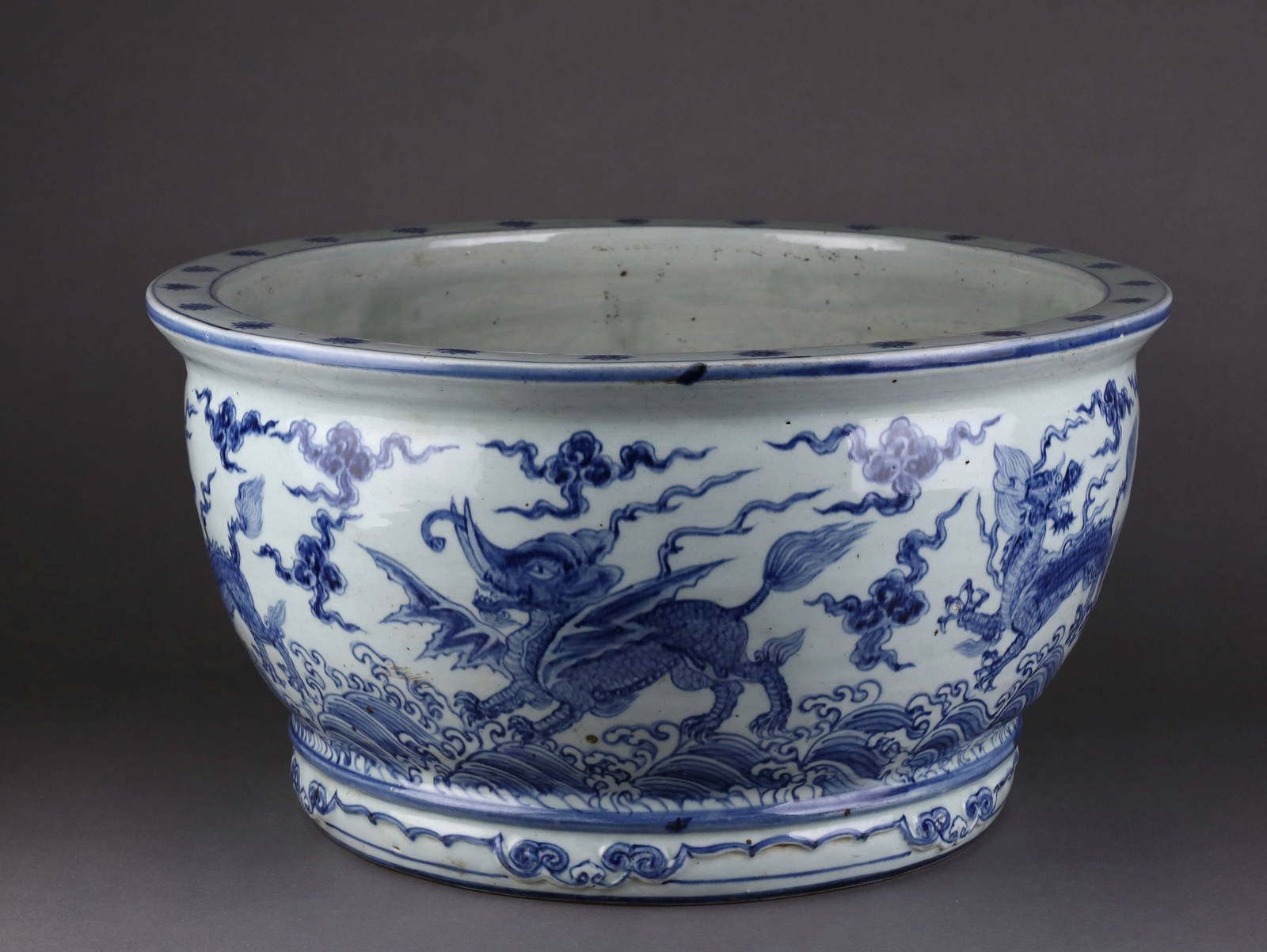 A Blue And White Vase With Sea Animals Auction