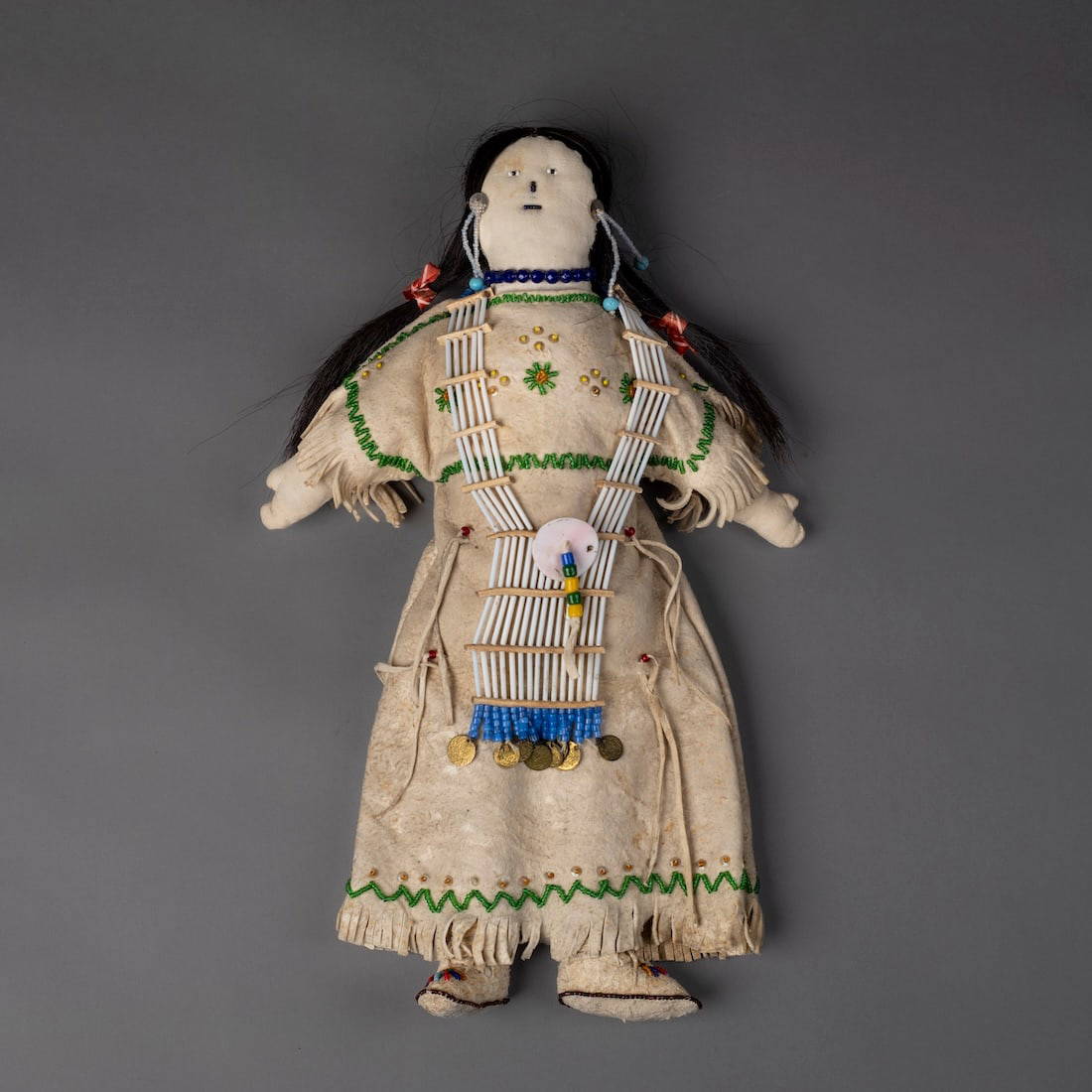A Plains Beaded Hide Doll Auction