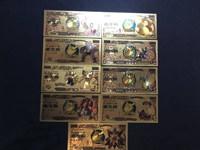 Pokemon Commemorative Gold Notes Lot Of 9