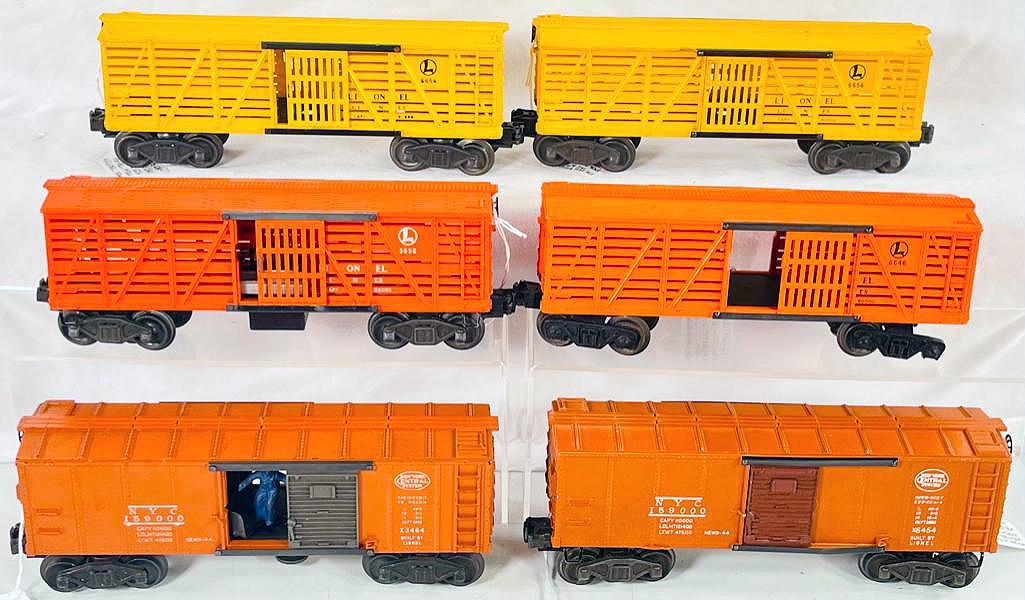 Lionel Postwar Four (4) Assorted Livestock Cars And Two (2) Box Cars