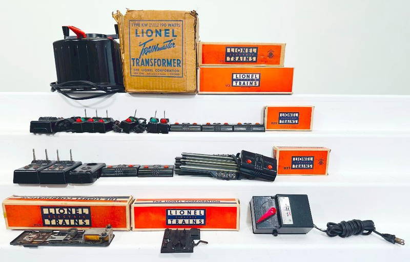 Lionel Postwar O Gauge Type Kw Transformer And Assorted Switch Controllers With Some Original Boxes