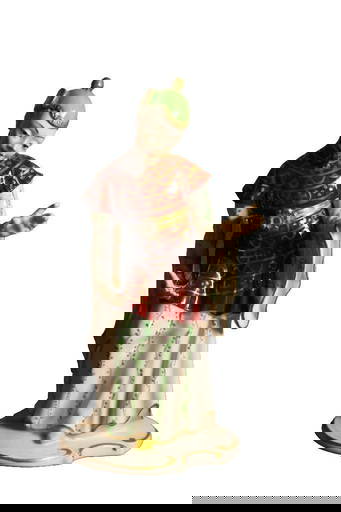 A Porcelain Chinese Priest Figurine