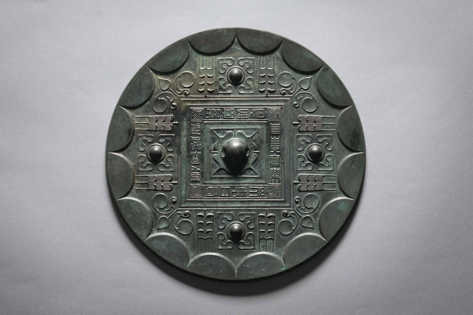 Inscription Grass Leaf Grain Bronze Mirror, Han Dynasty