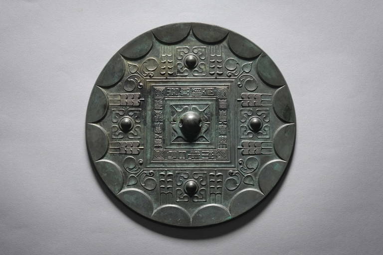 Inscription Grass Leaf Grain Bronze Mirror, Han Dynasty