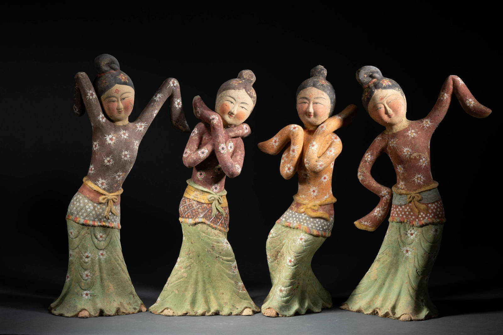 A Set Of Tri-coloured Glazed Pottery Statues, Tang Dynasty Auction