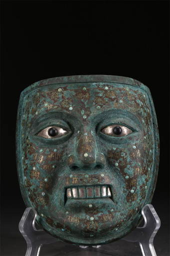 A BRONZE FACE MASK WITH GOLD AND SILVER INLAY. (#0030) on May 31, 2022 ...