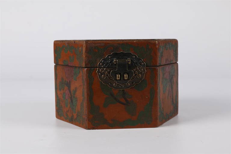 A Hexagonal Wood Box With Dragon Design.