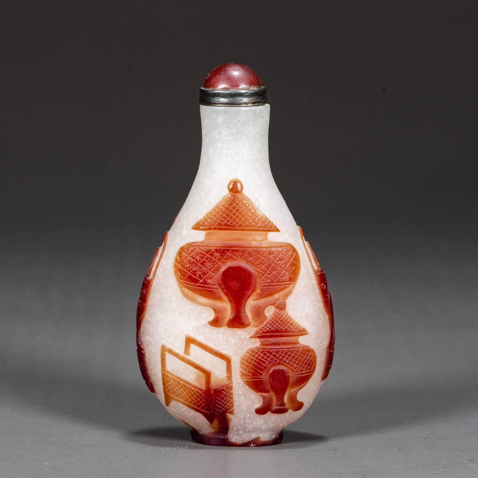 A Glass Snuff Bottle, Carved Curios Design. Auction