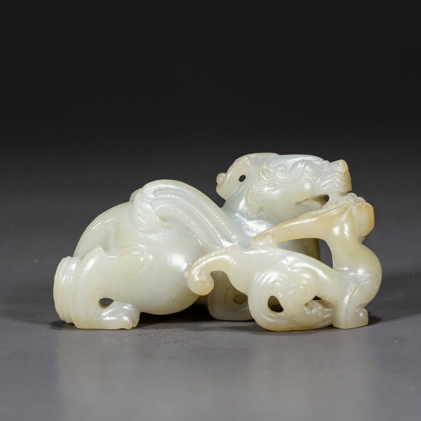 An Ancient Jade Auspicious Beast "bixie" Statue. Auction