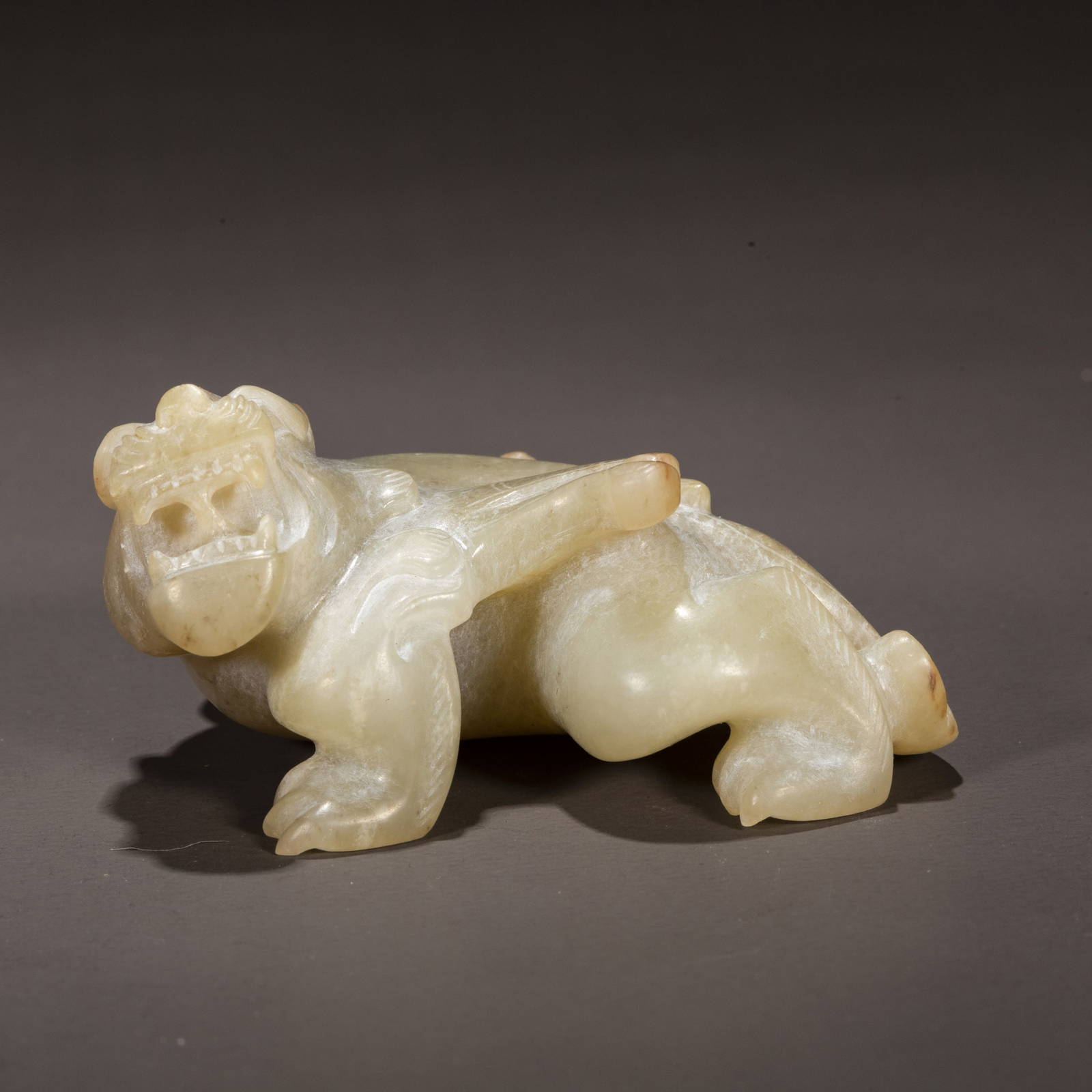 An Ancient Jade Auspicious Beast "bixie" Statue. Auction