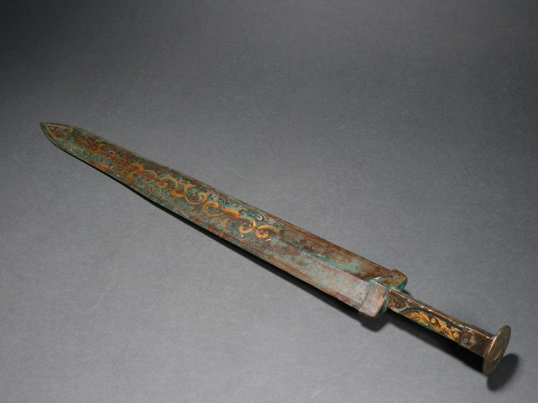A Fine Bronze Inlaid Gold And Silver Sword