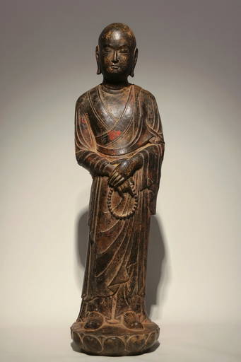 Statue Of Venerable Ananda On The Cliff In Tang Dynasty