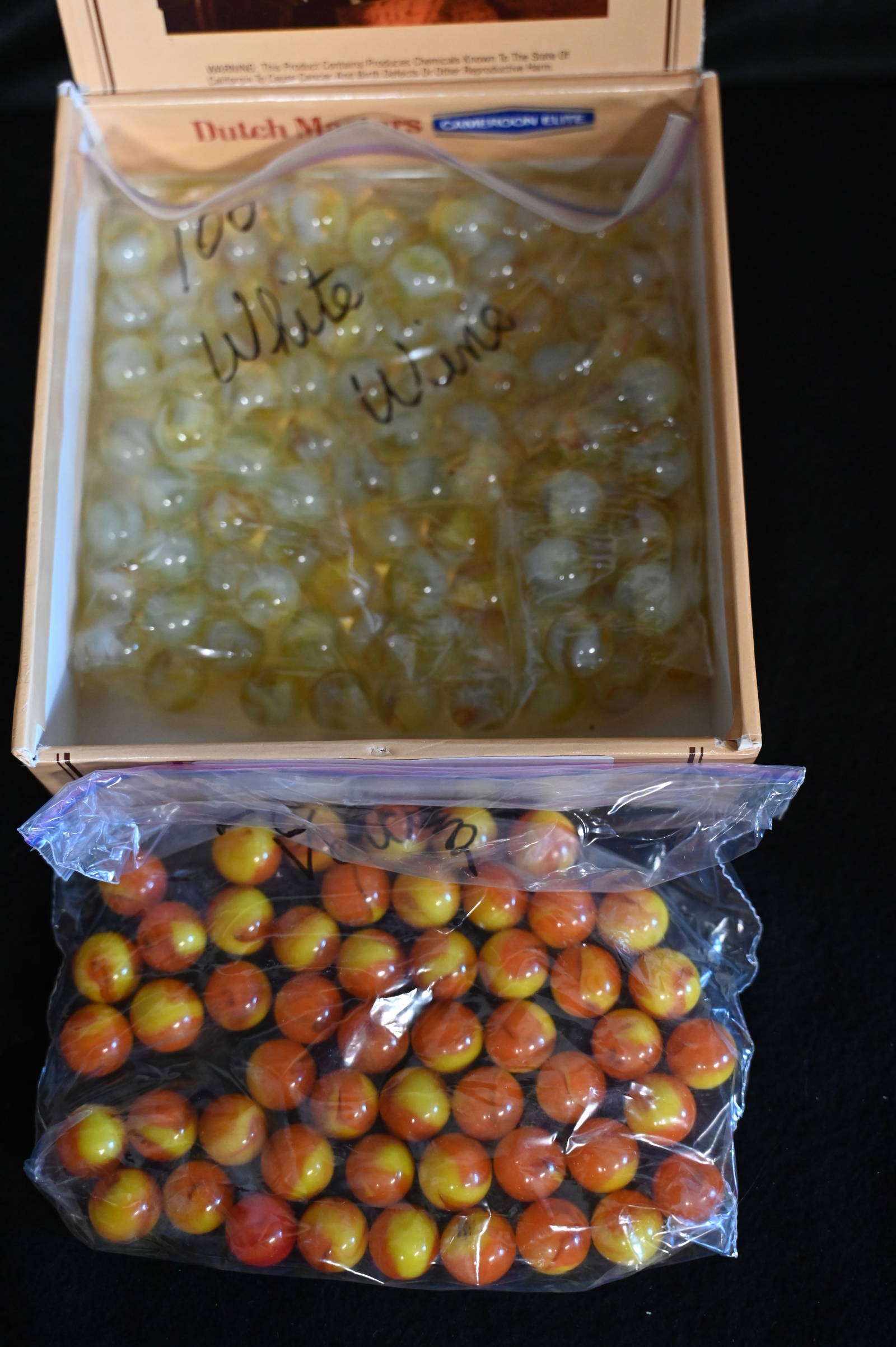 100 White Wine Marbles And 50 Volcano Marbles In A Dutch Masters Cigar Box. The Size Of The ...