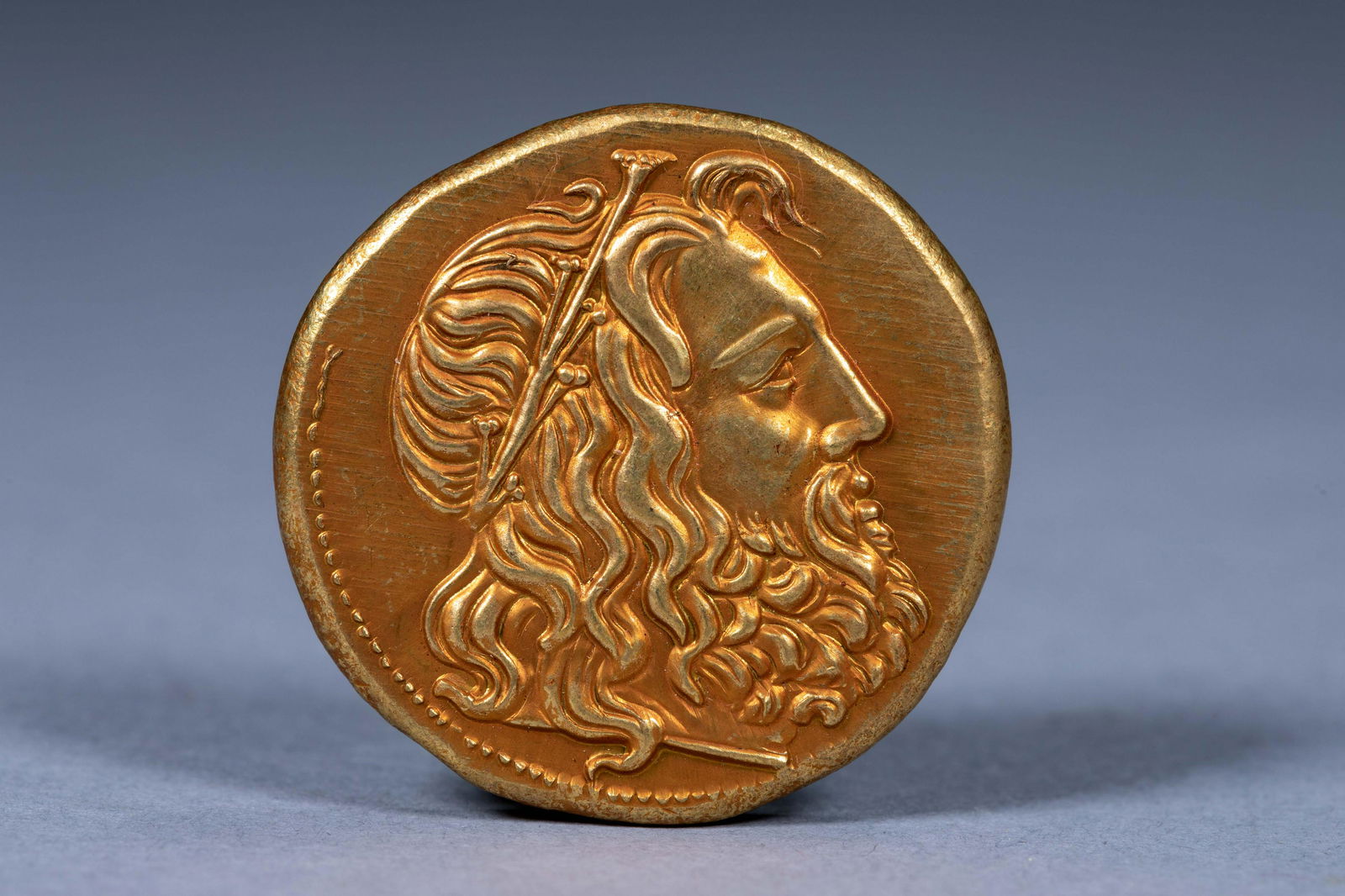 Statue Of A Craftsman On The Back Of An Ancient Greek Gilt Coin