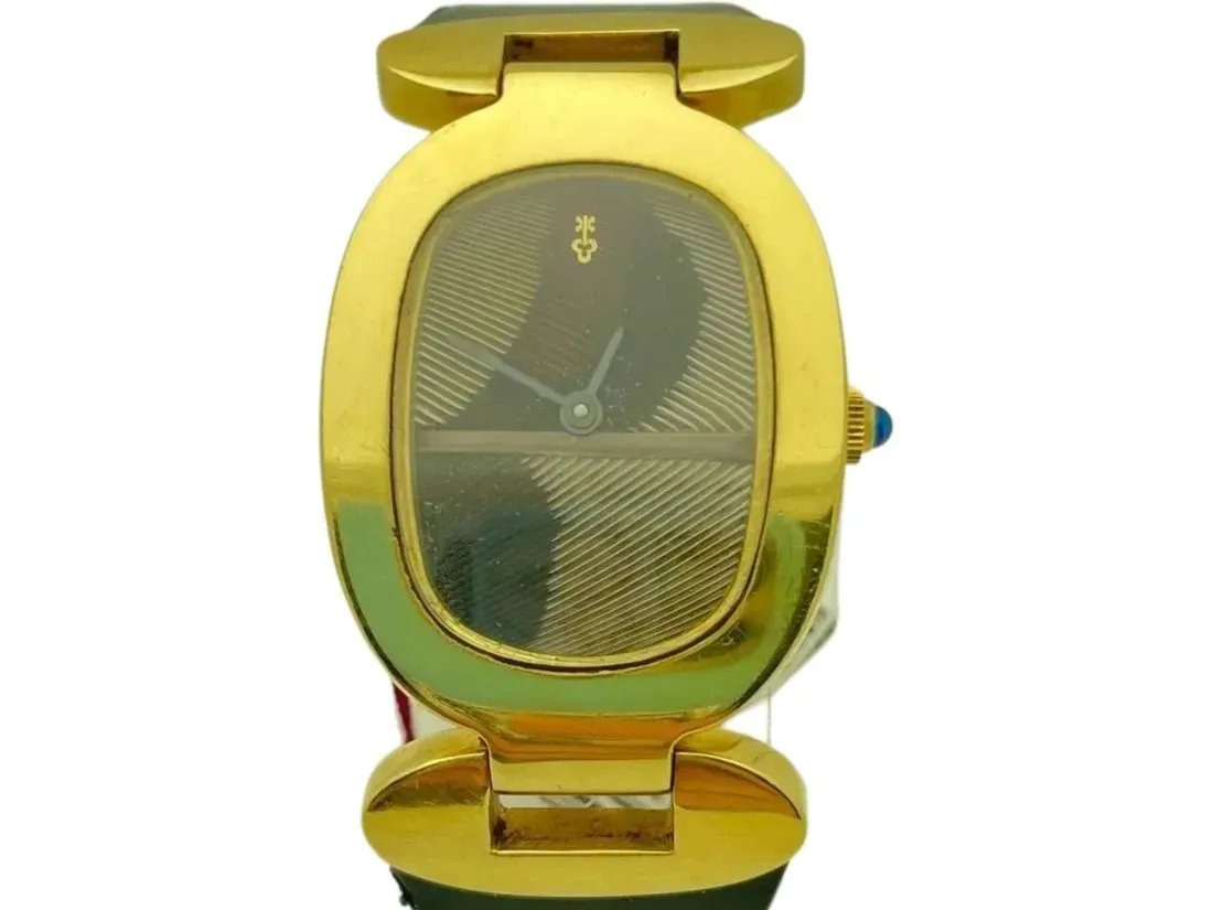 1970's Corum Peacock Feather Ladies Watch 18kyg Bezel Auction