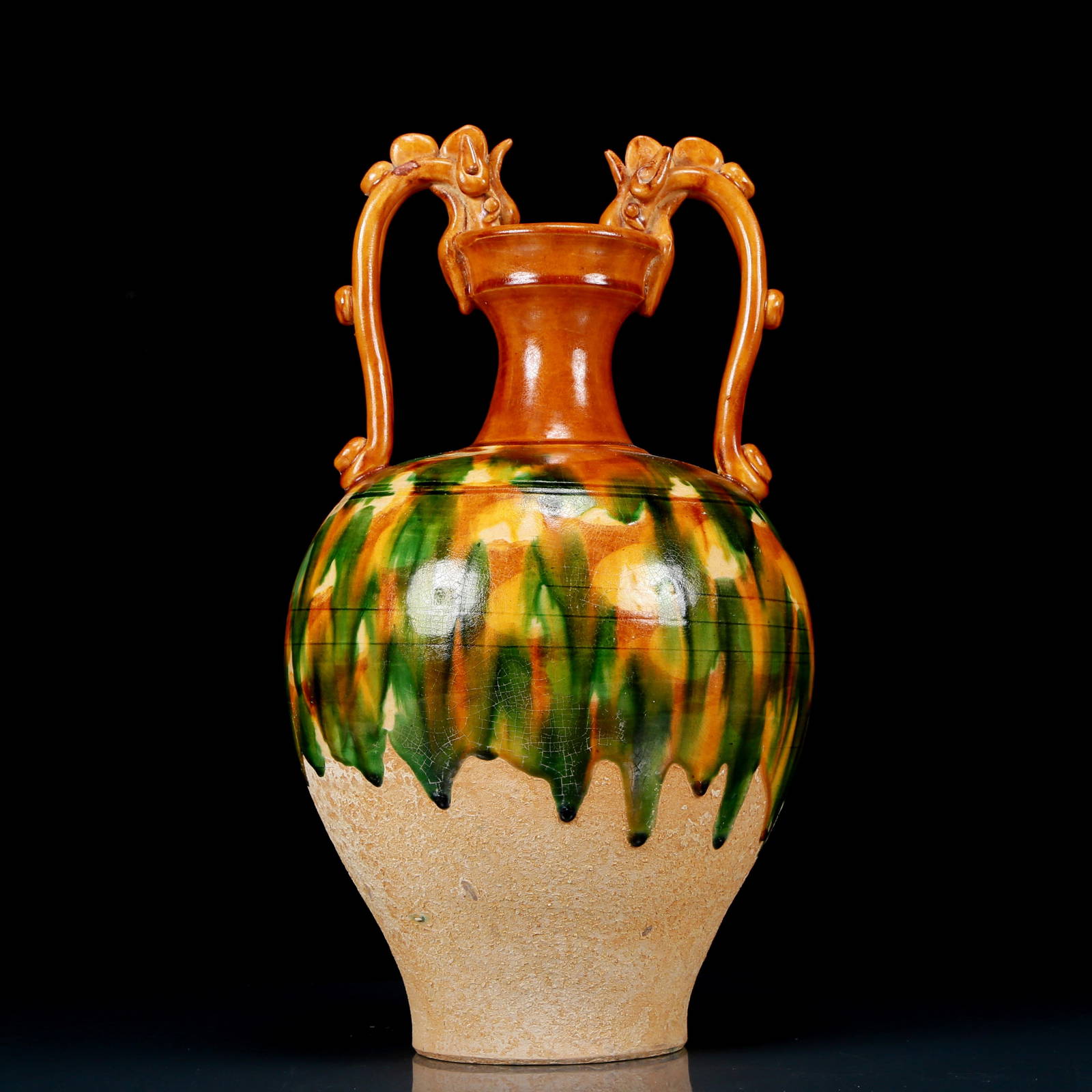 A Rare Tang Tri-color Glazed Pottery Double Dragon Ears Vase Auction