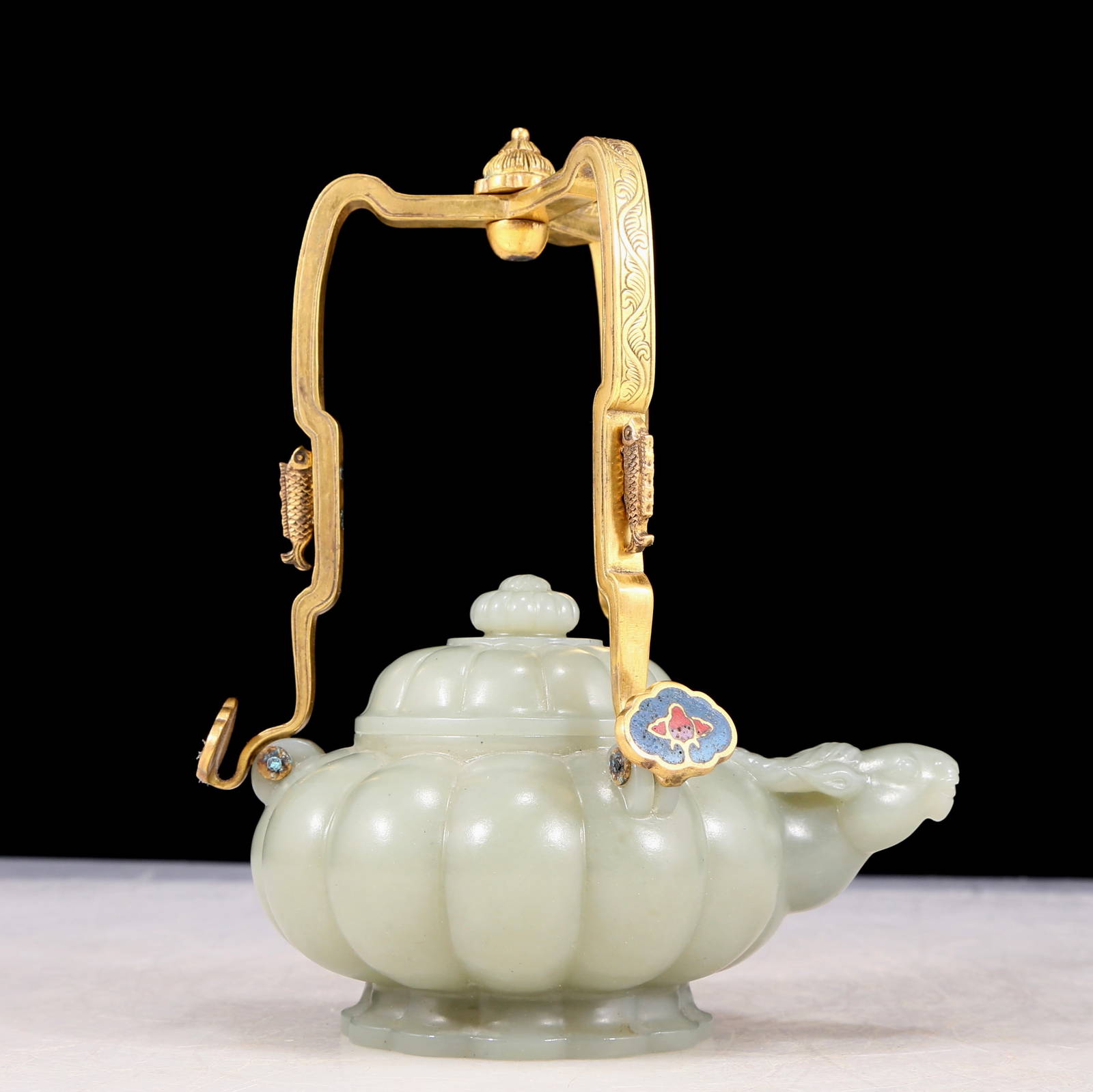 An Exquisite White Jade Sheep's Head Teapot Auction