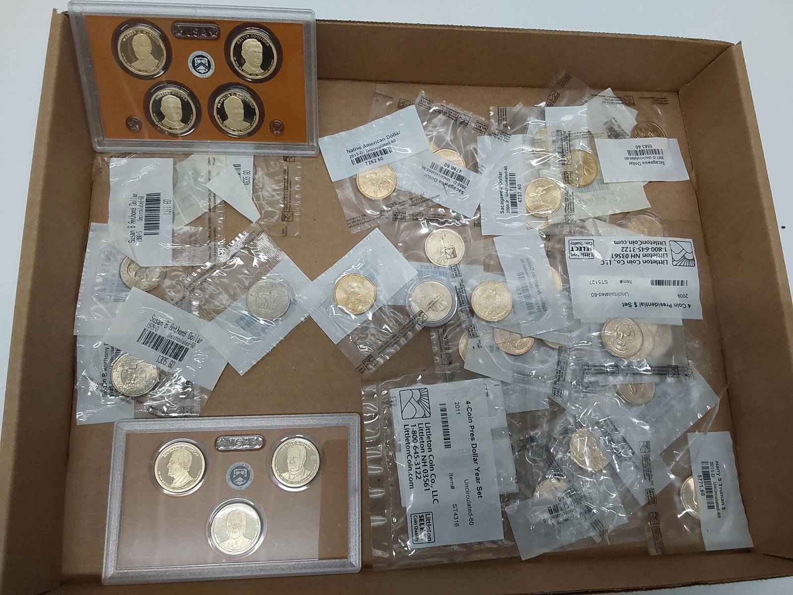 Flat Of Uncirculated Coins In Plastic Auction