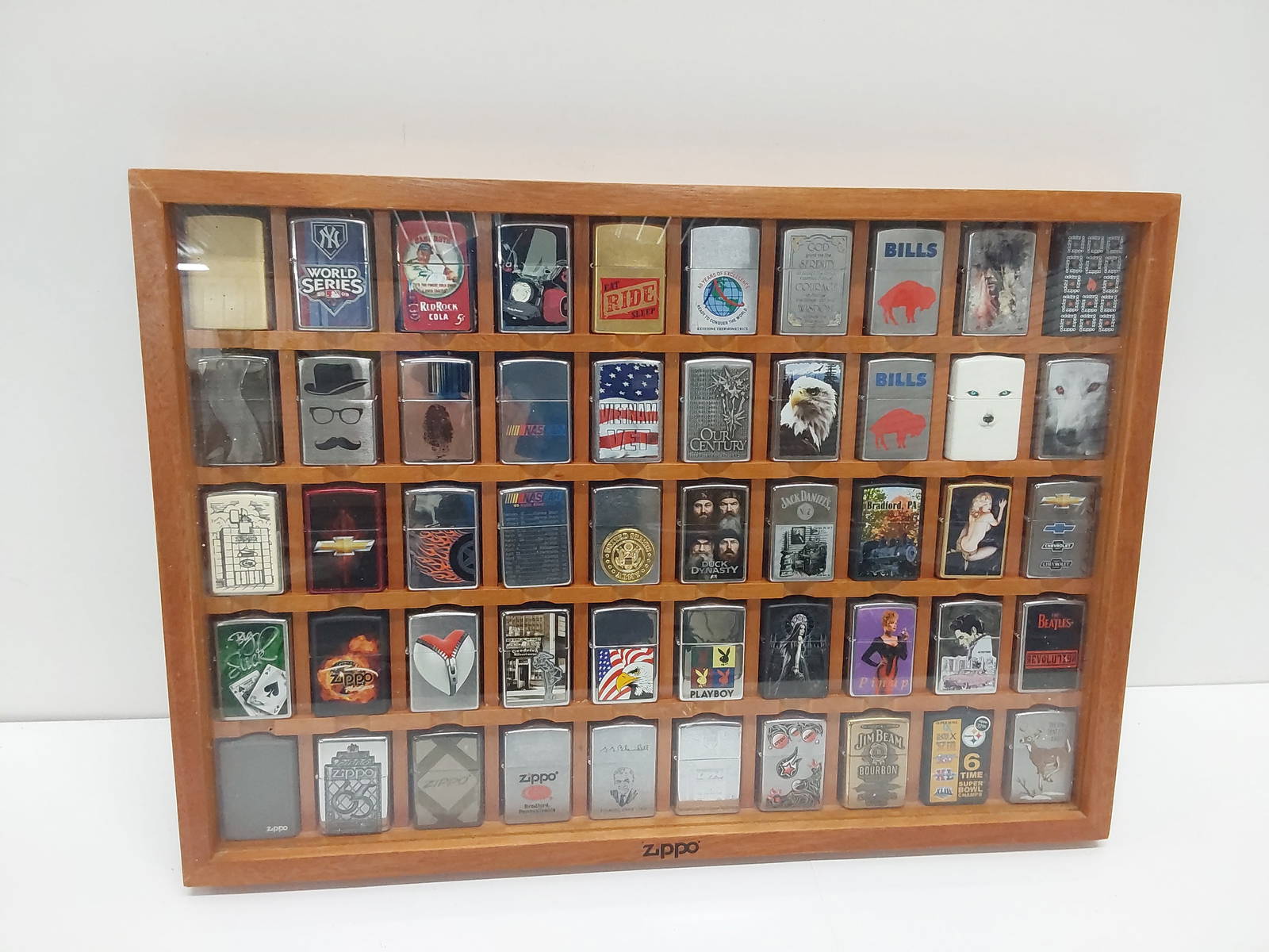 (50) Zippo Lighters, Original Zippo Display Auction