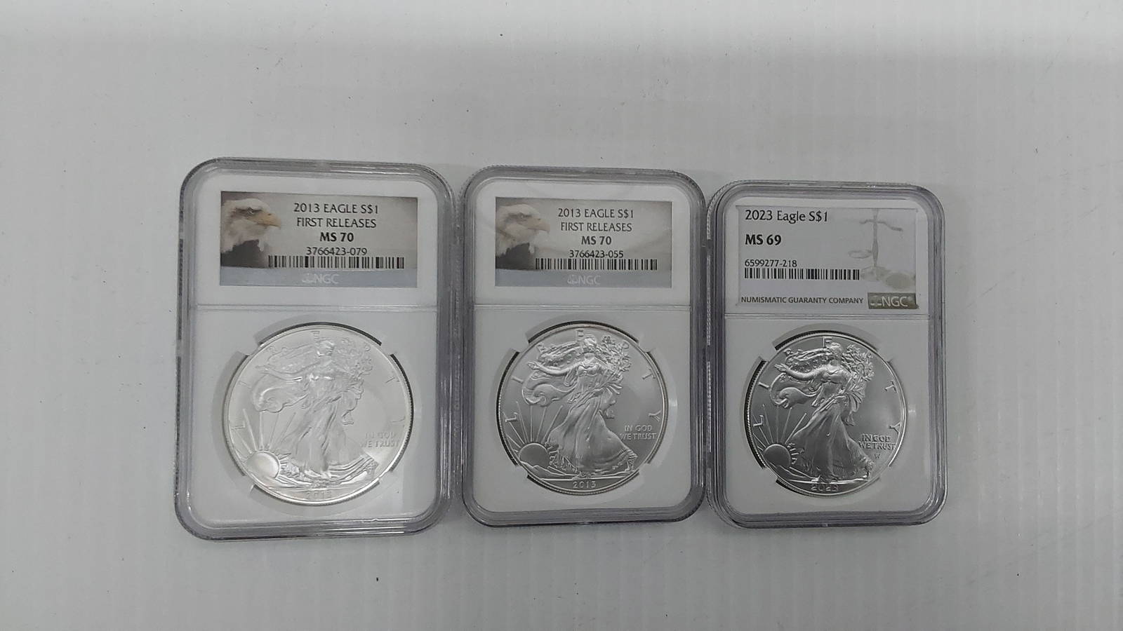 (3) Graded Silver Eagles Auction