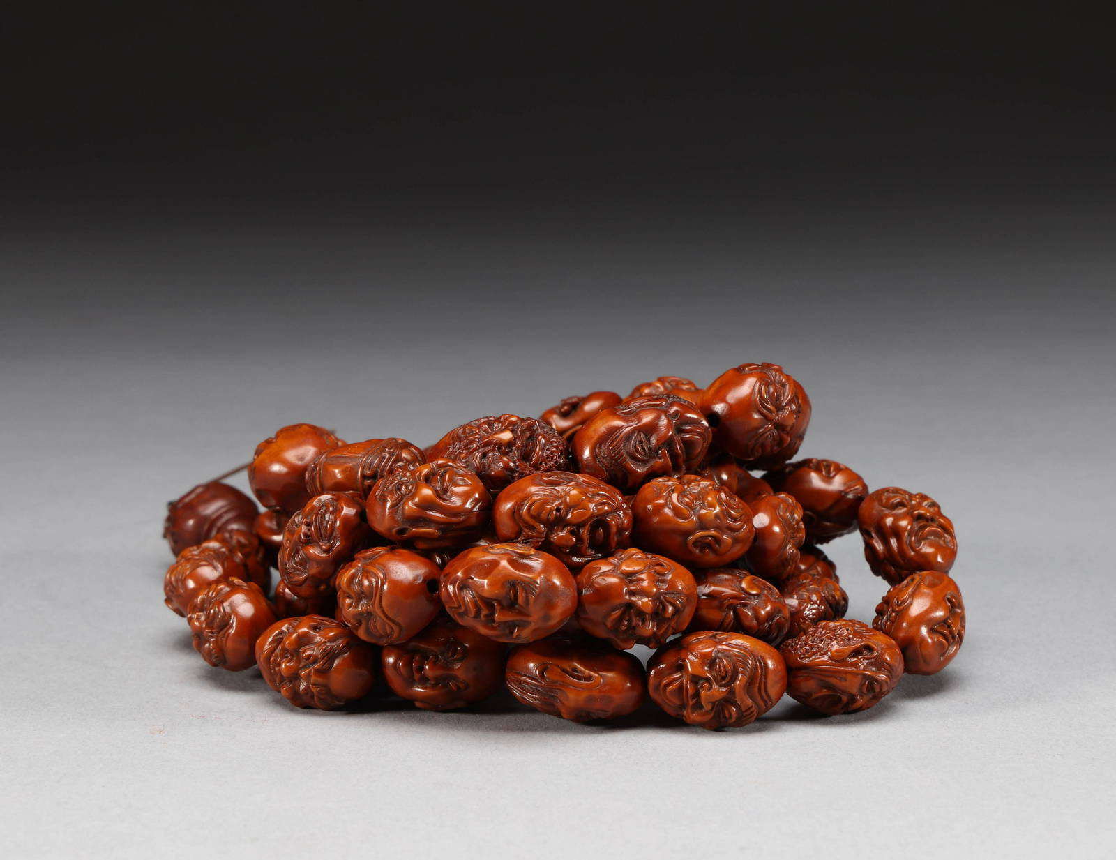 Qing Dynasty Olive Kernel Arhat Auction