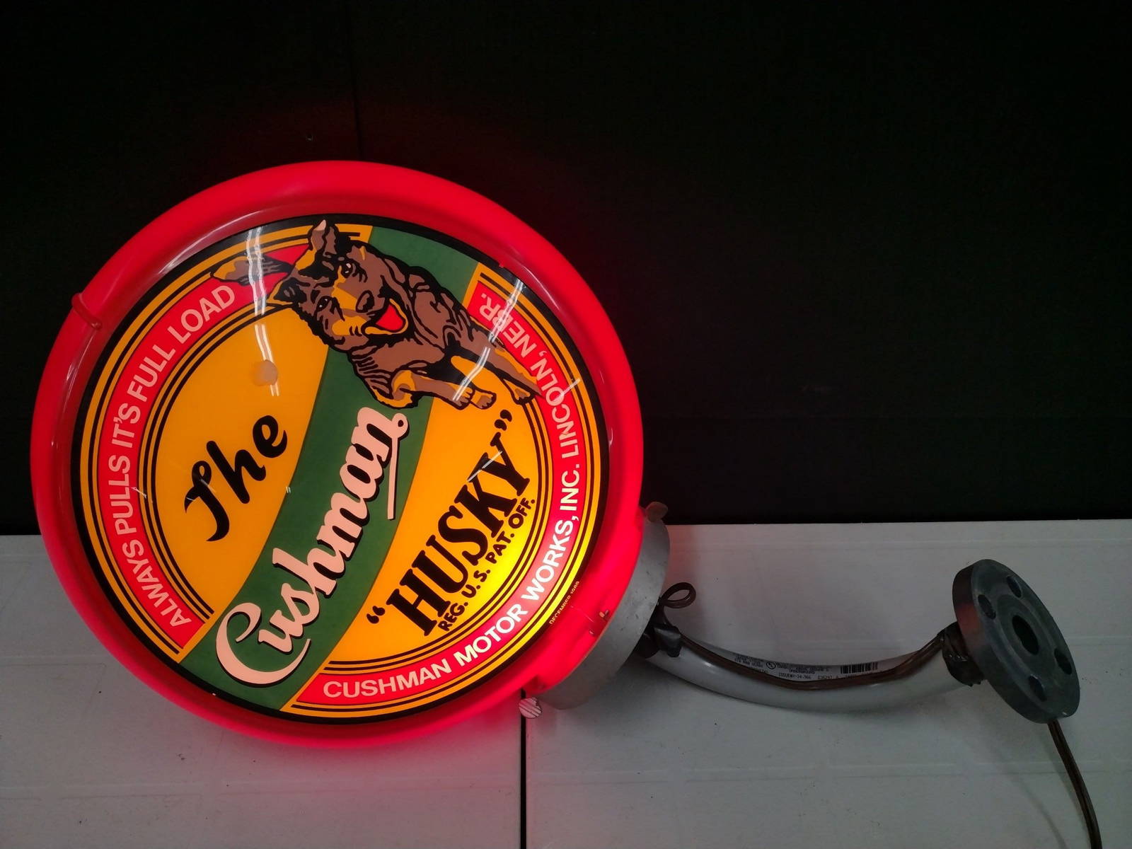 The Cushman Husky Double-sided Lighted Advertising Sign Auction