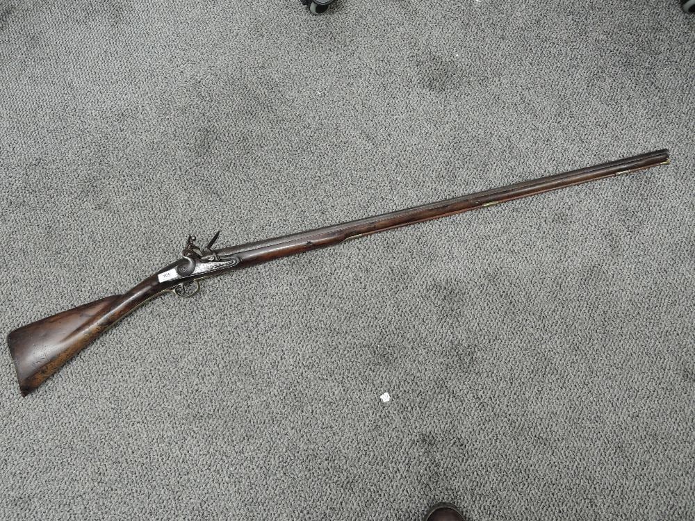 A Single Barrel Flintlock Musket, Ram Rod, Proof Mark V, Plain Wood ...