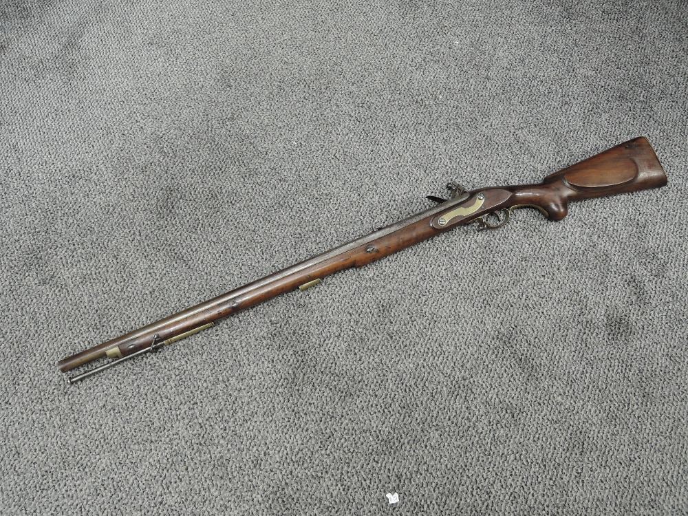 A Single Barrel Flintlock Musket With Ram Rod, Possible Reproduction Or ...