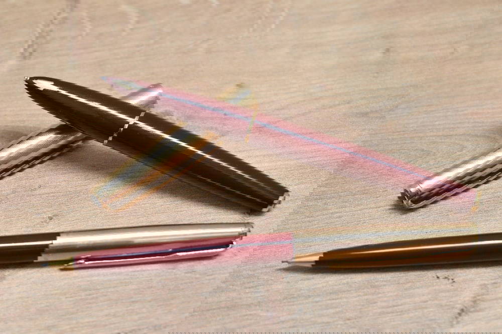 A Parker 61 Custom Capillary Fill Fountain Pen, And Propelling Pencil ...