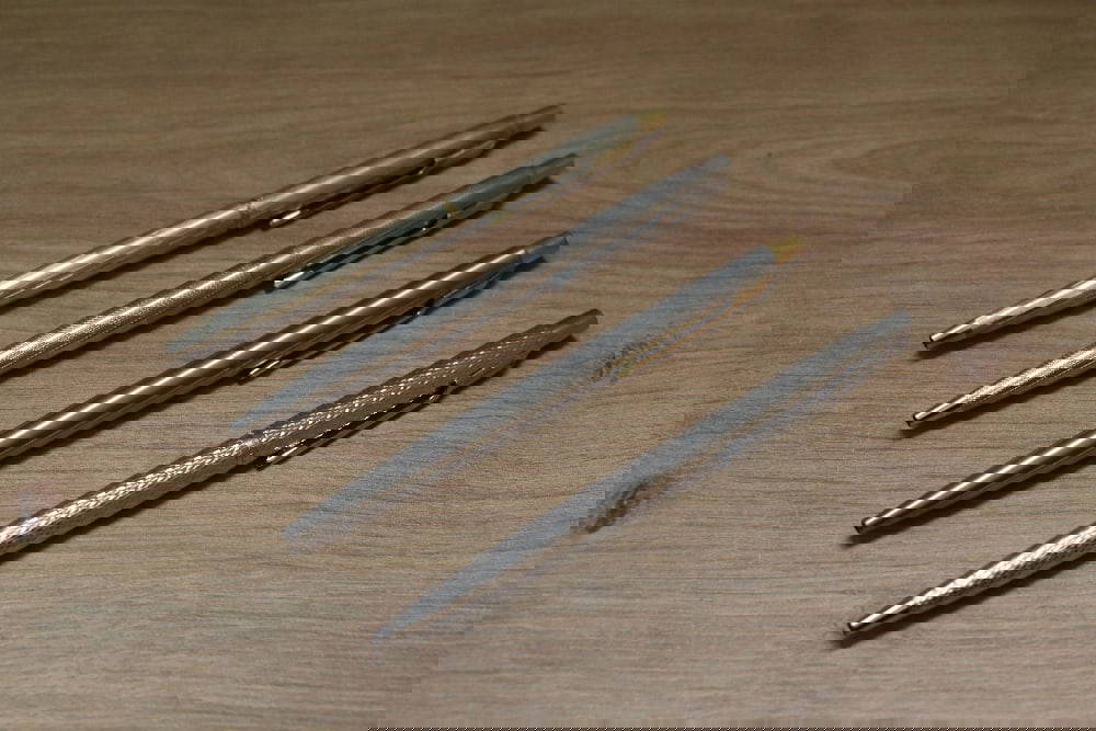 Four Parker Classic Ballpoint Pens In Various Metallic Finishes Auction