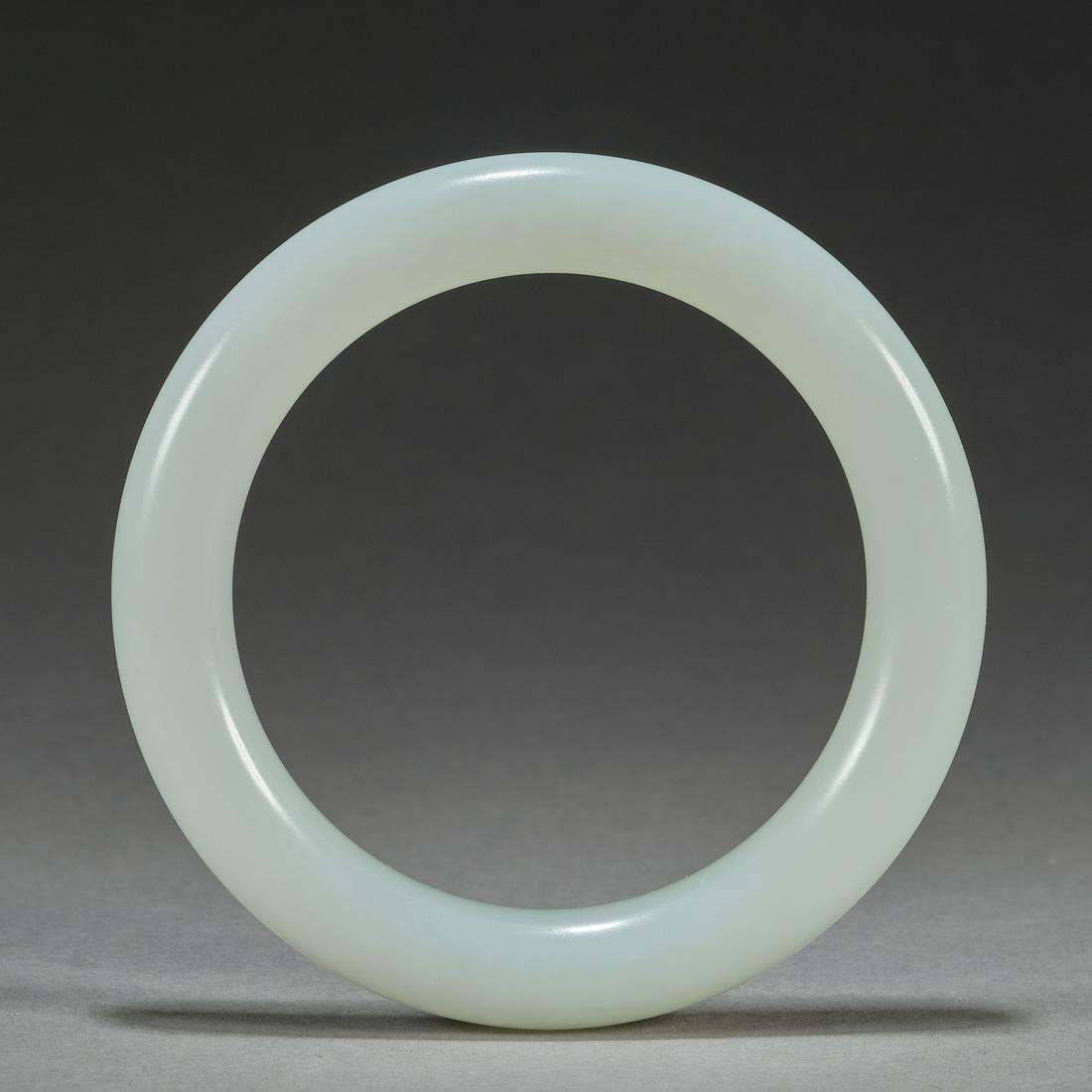 A White Jade Bangle,qing Dynasty,inner Diameter:5.7cm Weight:60g