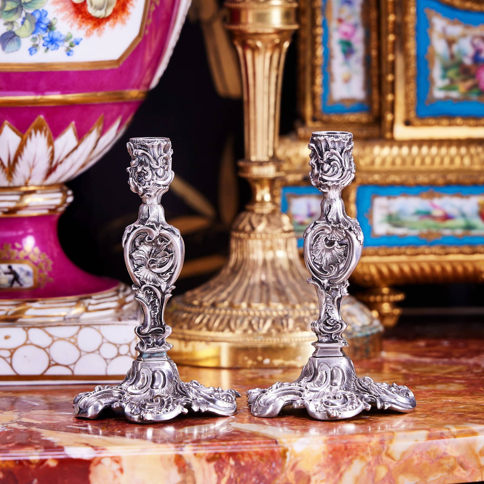 A Pair Of Faberge Style Silver Candlesticks In Display Case Auction