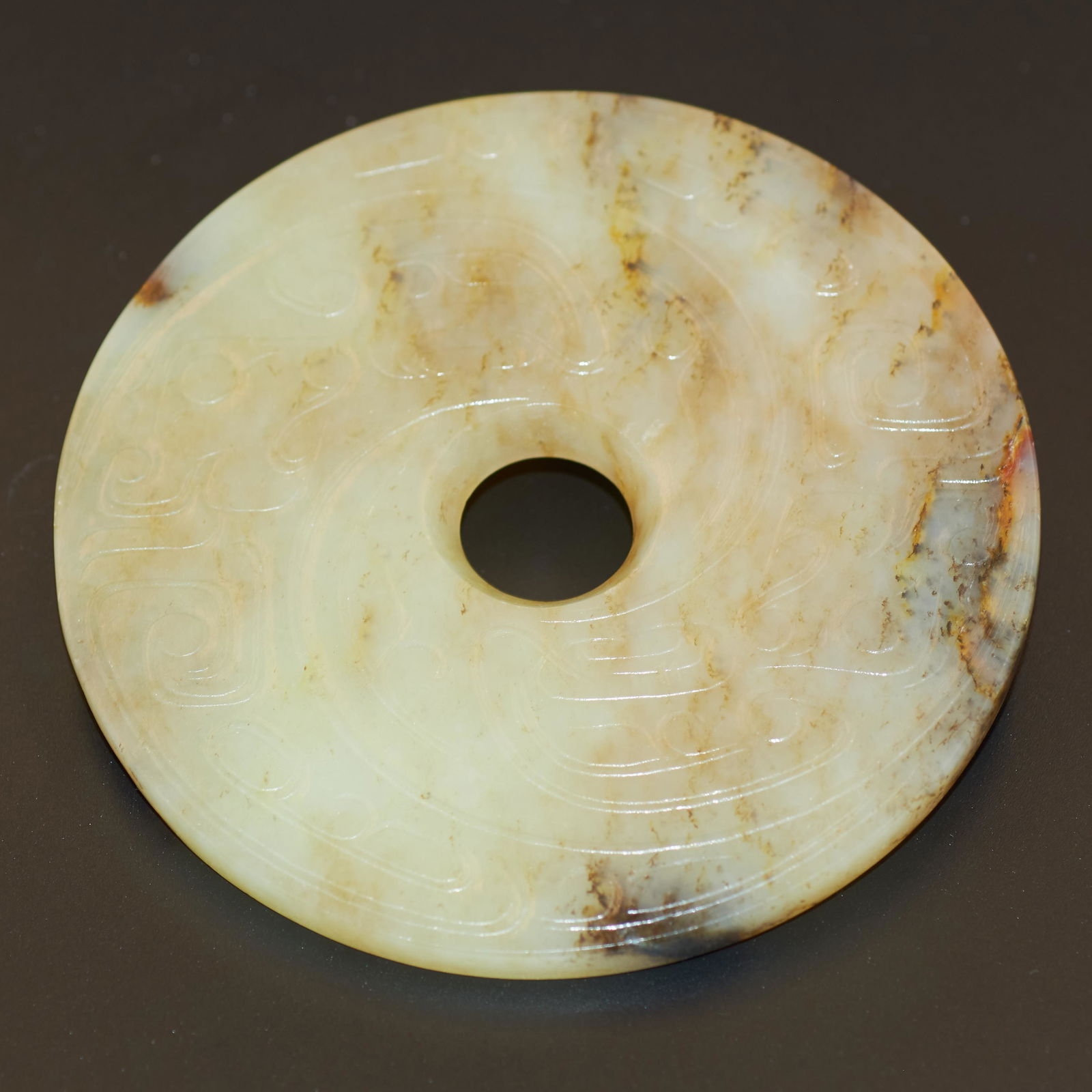 A White Jade Disc, Bi, Western Zhou (private English Collection) Auction