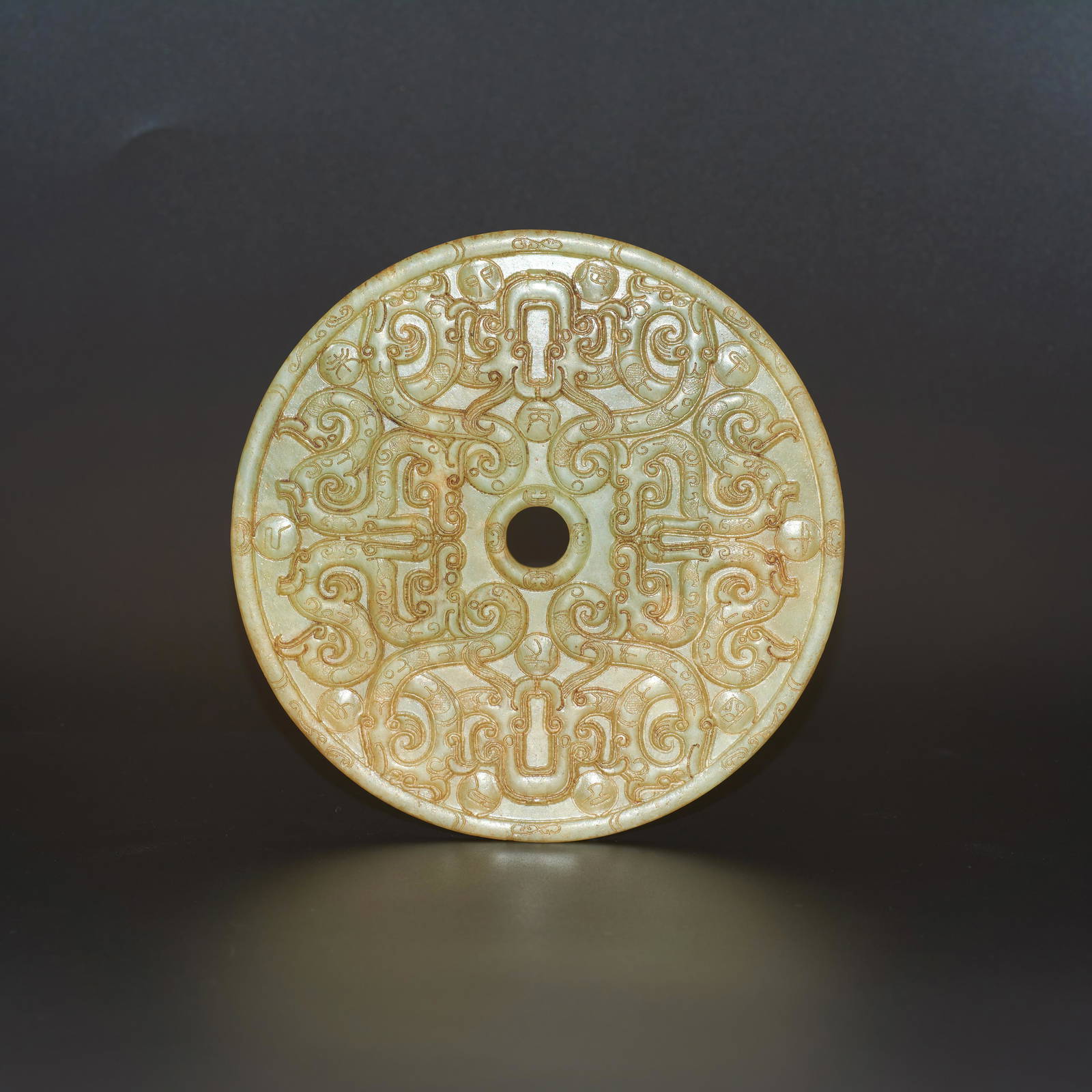 An Archaistic Style Jade Disc Bi, Ming Dynasty (private English ...