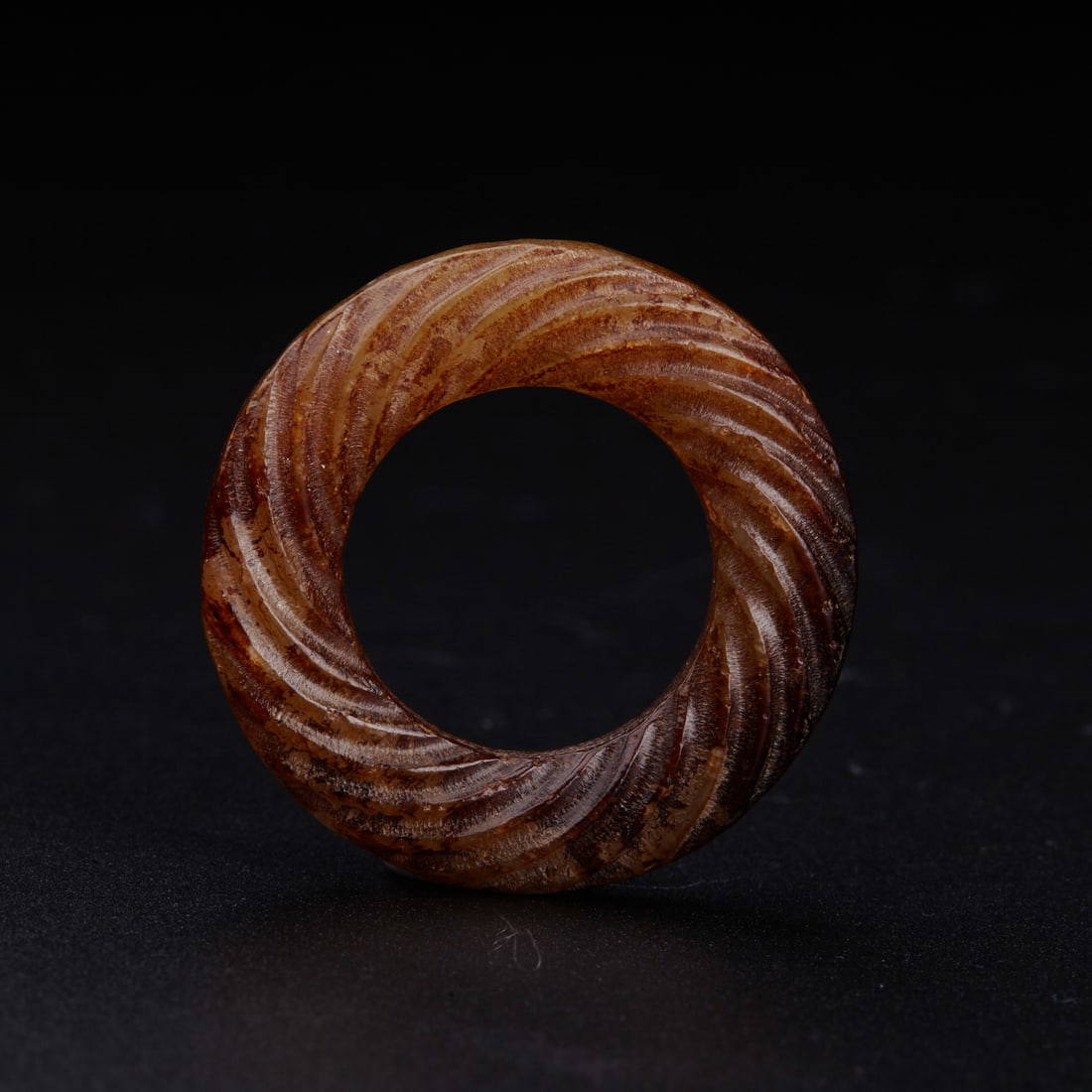 A Russet Jade Ring With 'twisted Rope' Pattern, Han Dynasty Auction