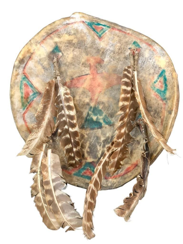 Plains Rawhide Shield With Feather Decorations Auction
