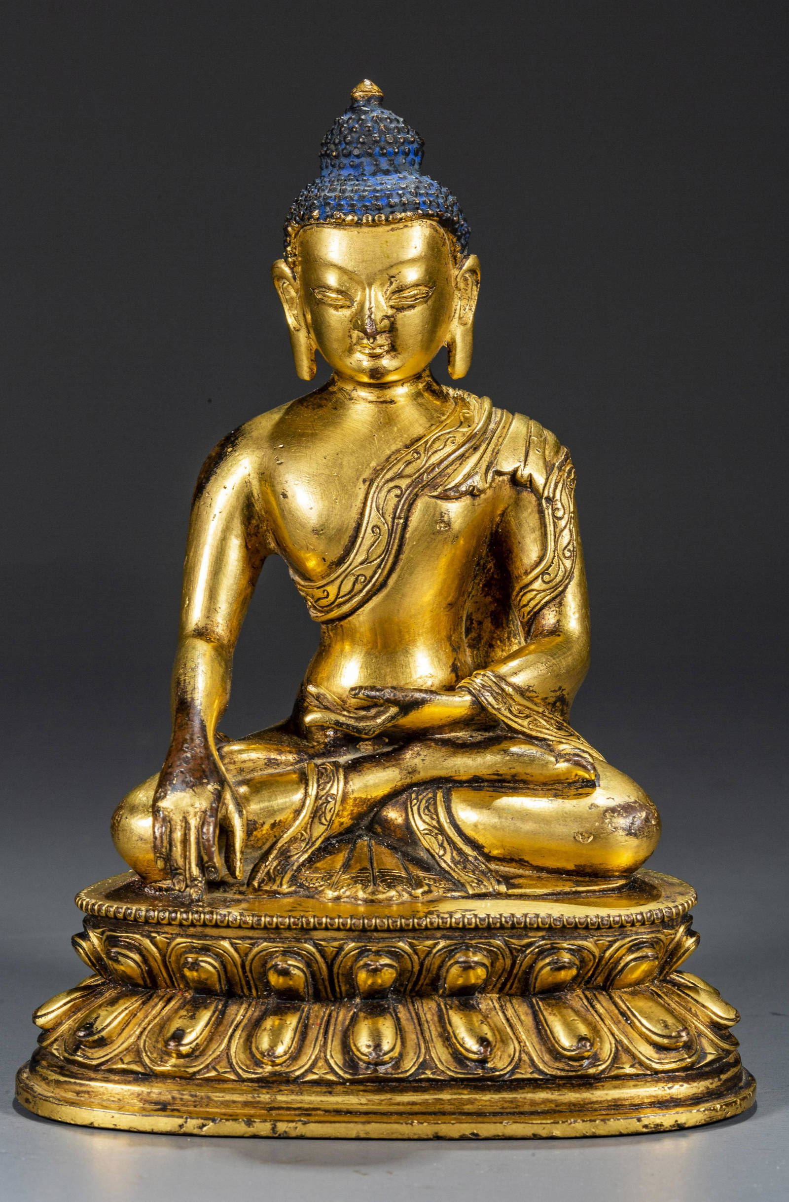 A Gilt Bronze Sakyamuni Buddha Statue. Auction
