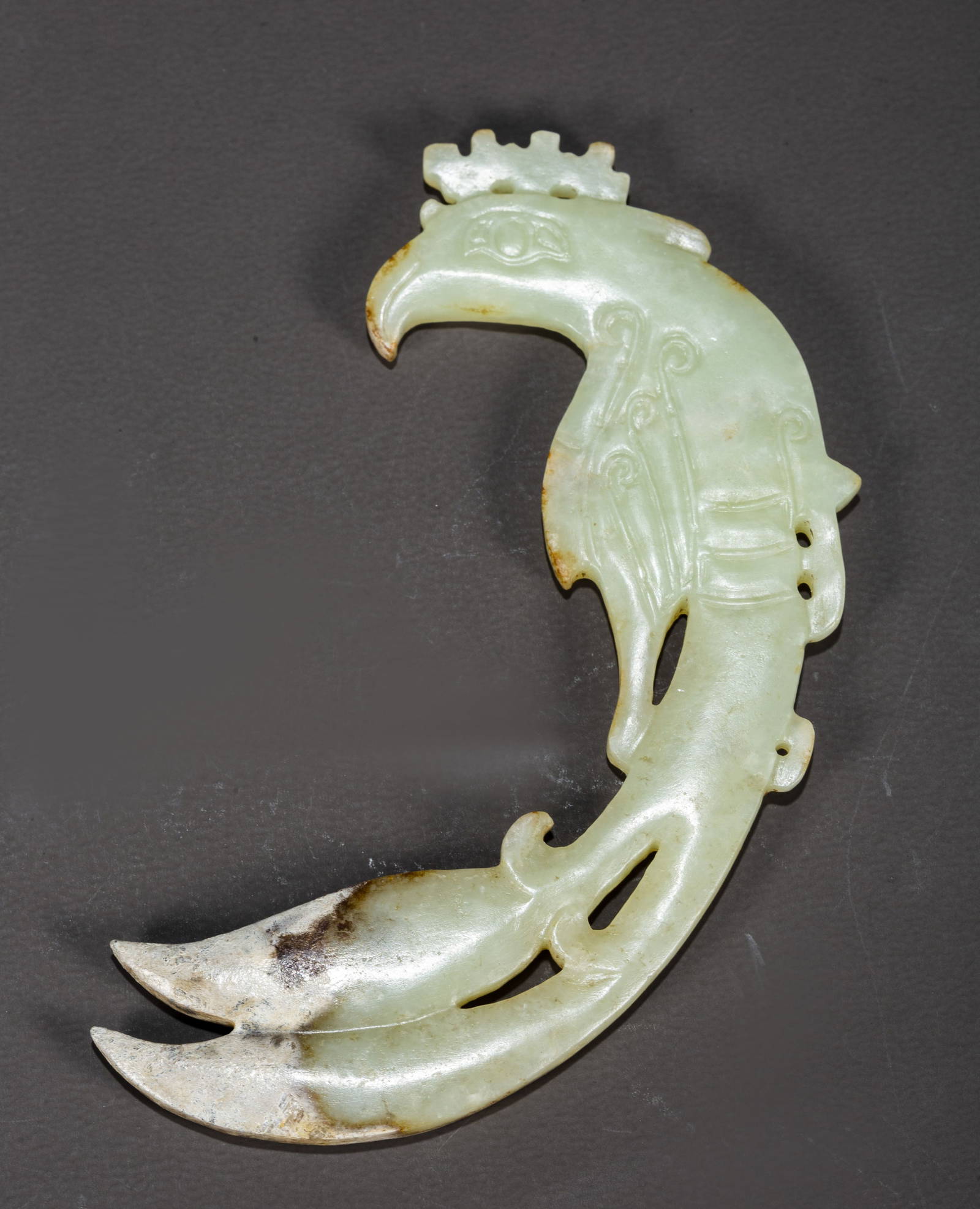 An Ancient Jade Phoenix Carving. Auction