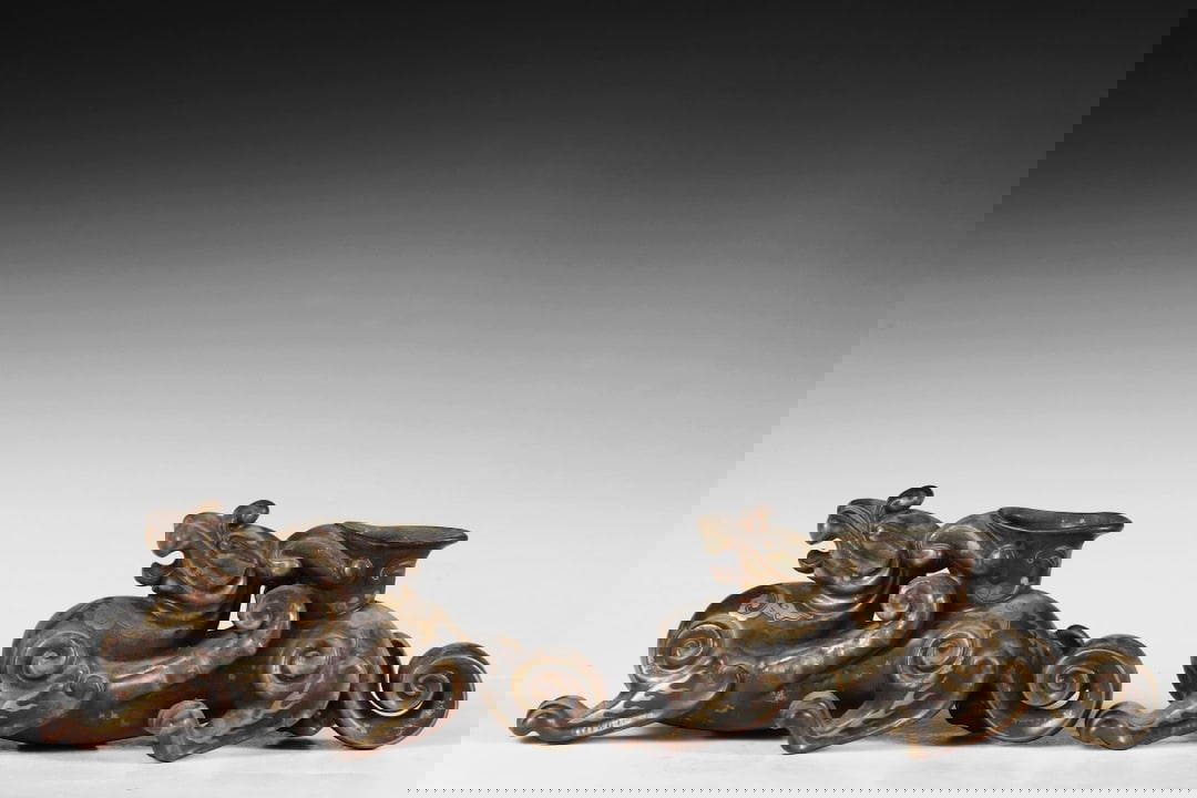 A Pair Of Bronze Glazed Porcelain Mythical Creature, Bixie Auction